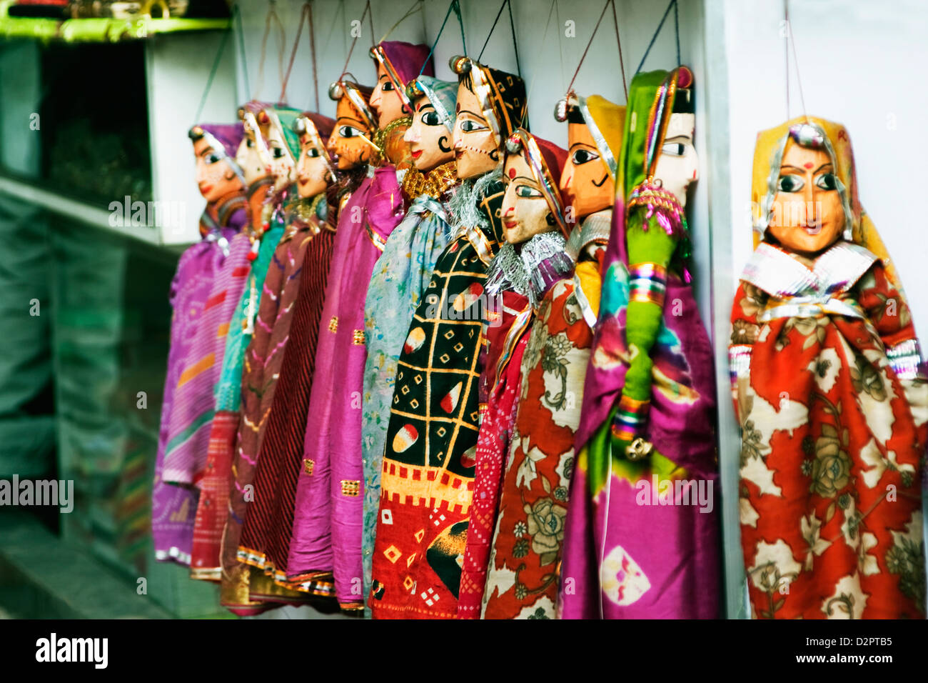 Wooden puppets hanging at a market stall, Delhi, India Stock Photo - Alamy