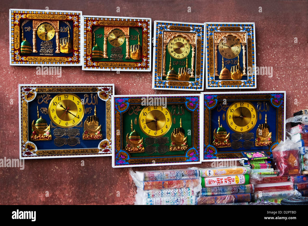 Books with clocks at a market stall, Delhi, India Stock Photo - Alamy