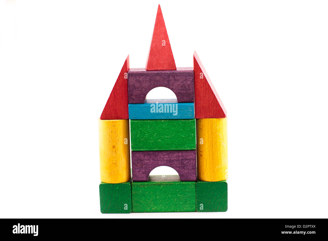 Toy wooden house from coloured blockes isolated on white background ...