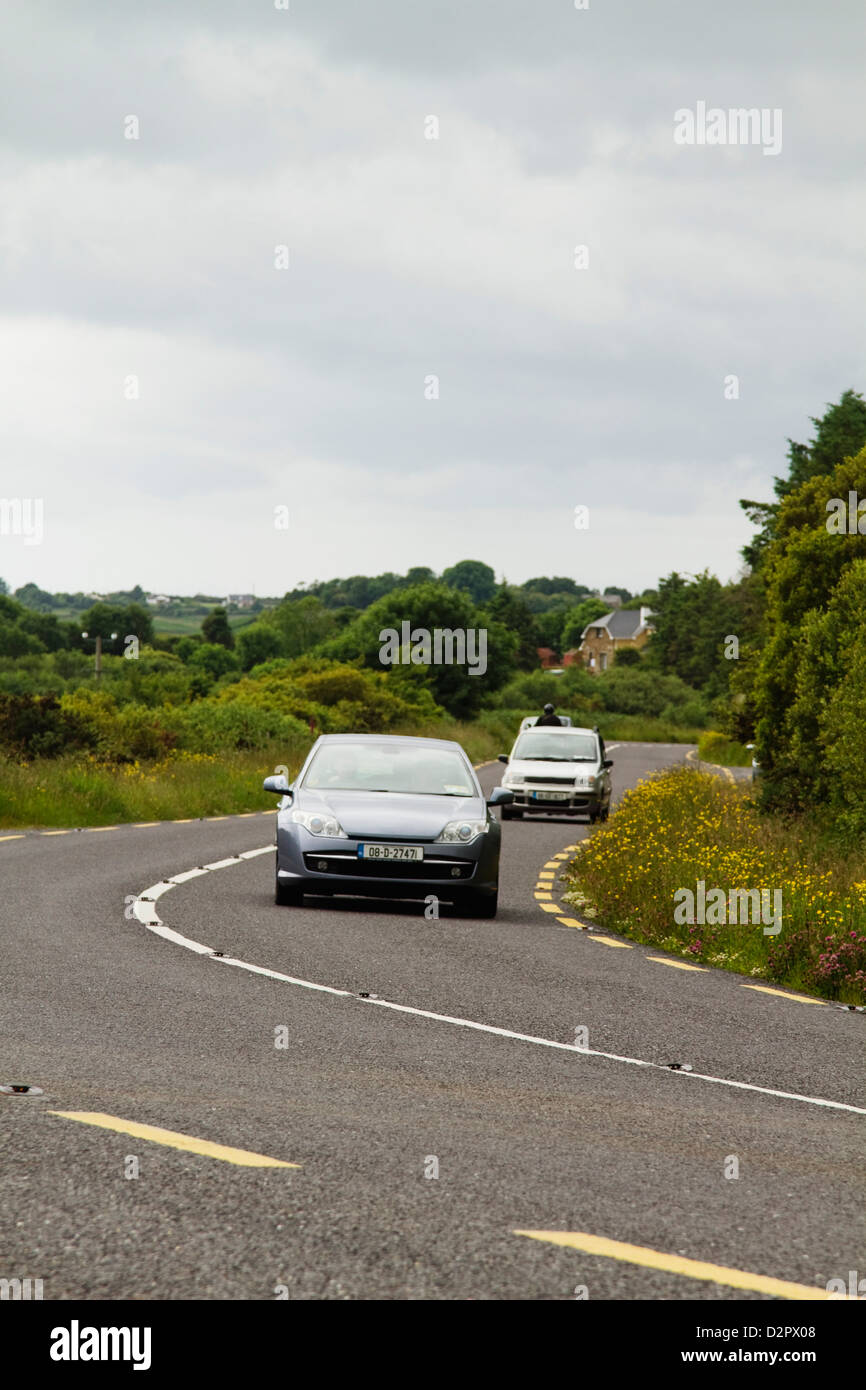 Cars on the road, Ring Of Kerry, County Kerry, Republic of Ireland ...