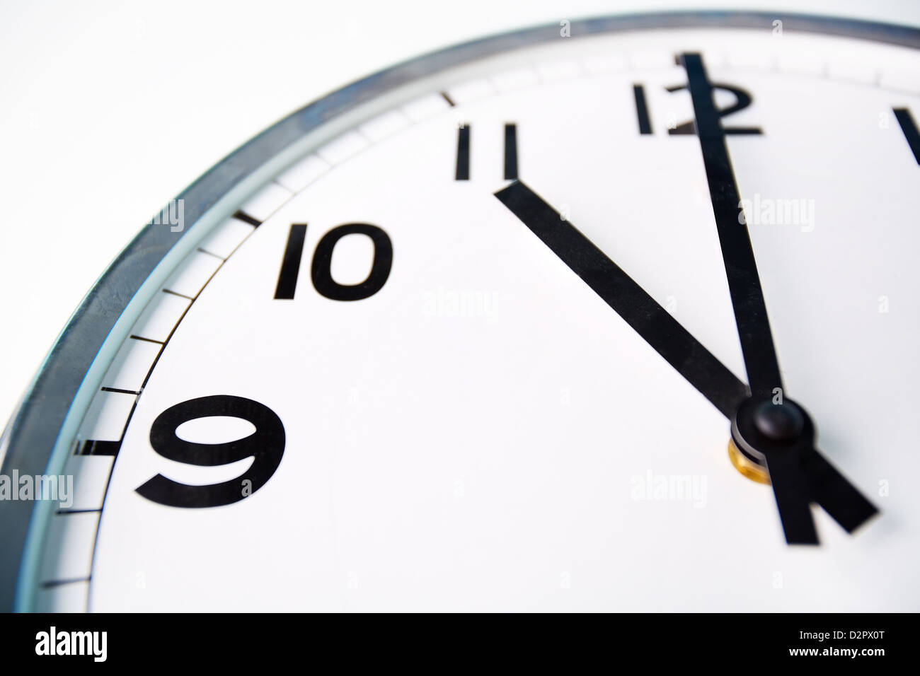 Wall clock showing time eleven hi-res stock photography and images - Alamy