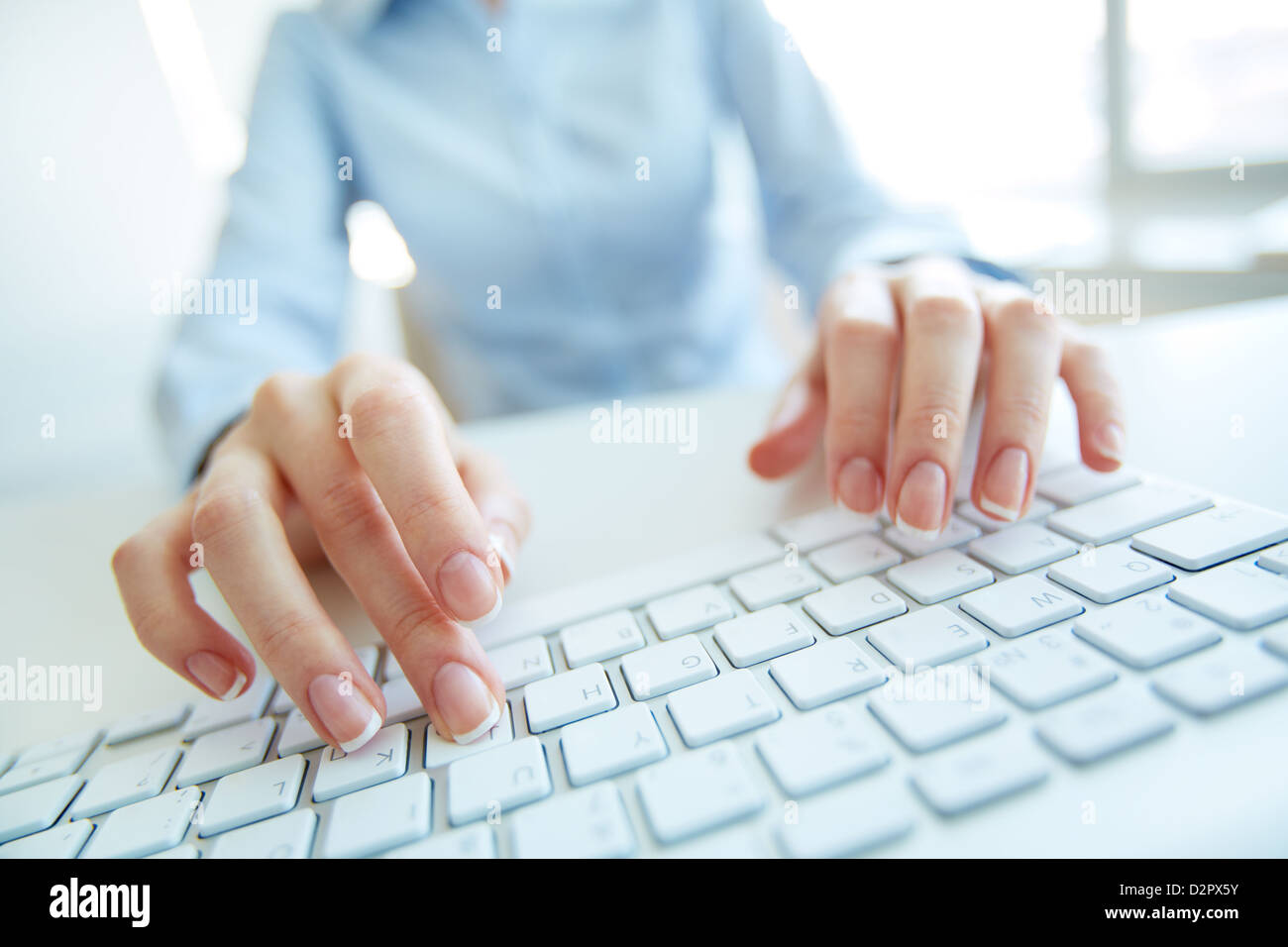 Busy secretary inputting data to the office computer Stock Photo - Alamy