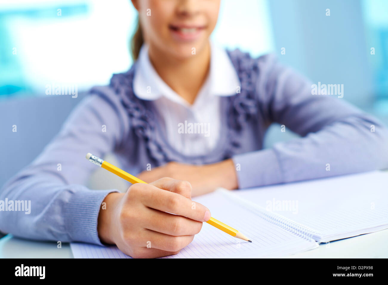 Close-up image of a girl doing her homework Stock Photo - Alamy