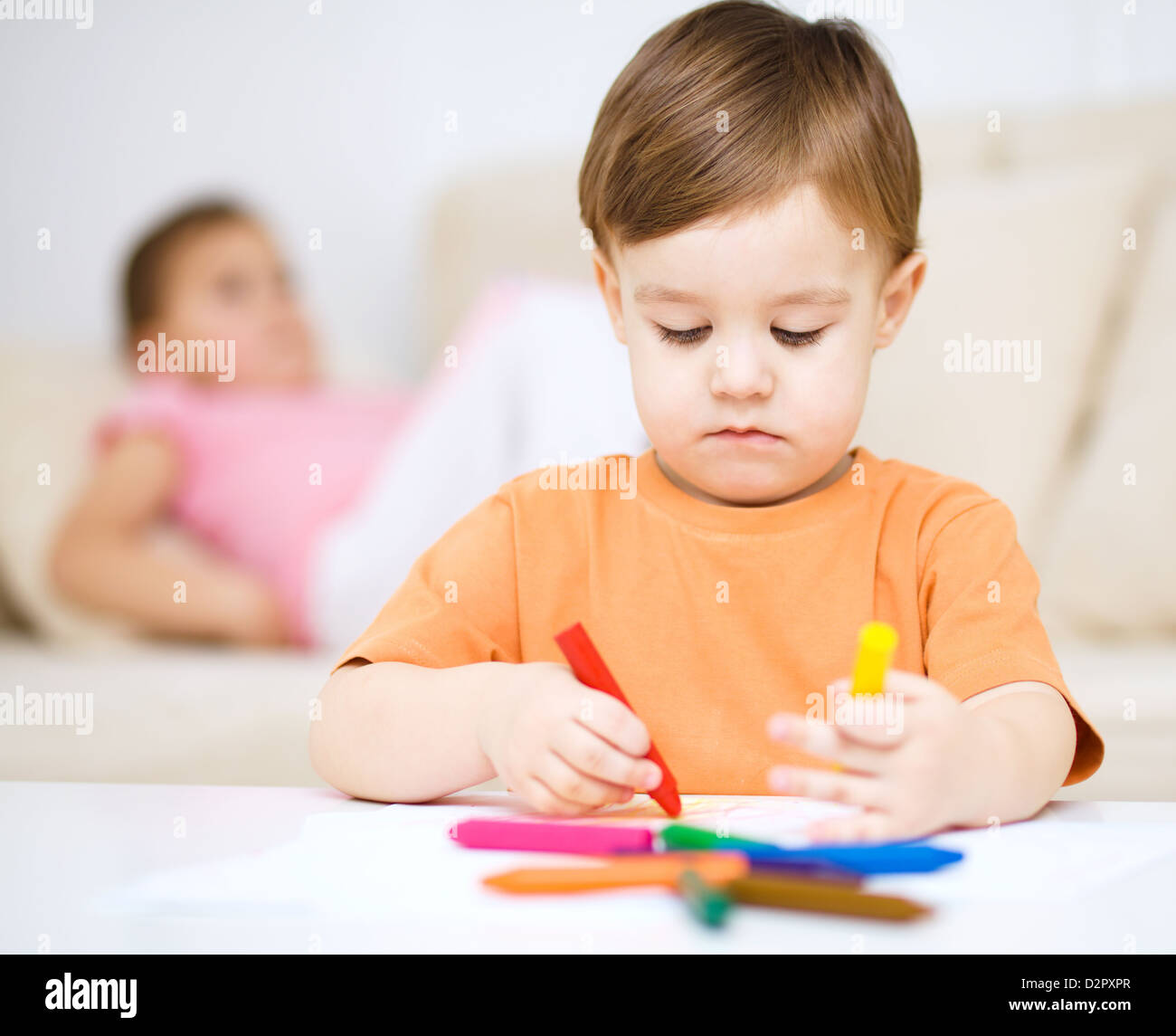 Boy Using Crayons High Resolution Stock Photography and Images - Alamy