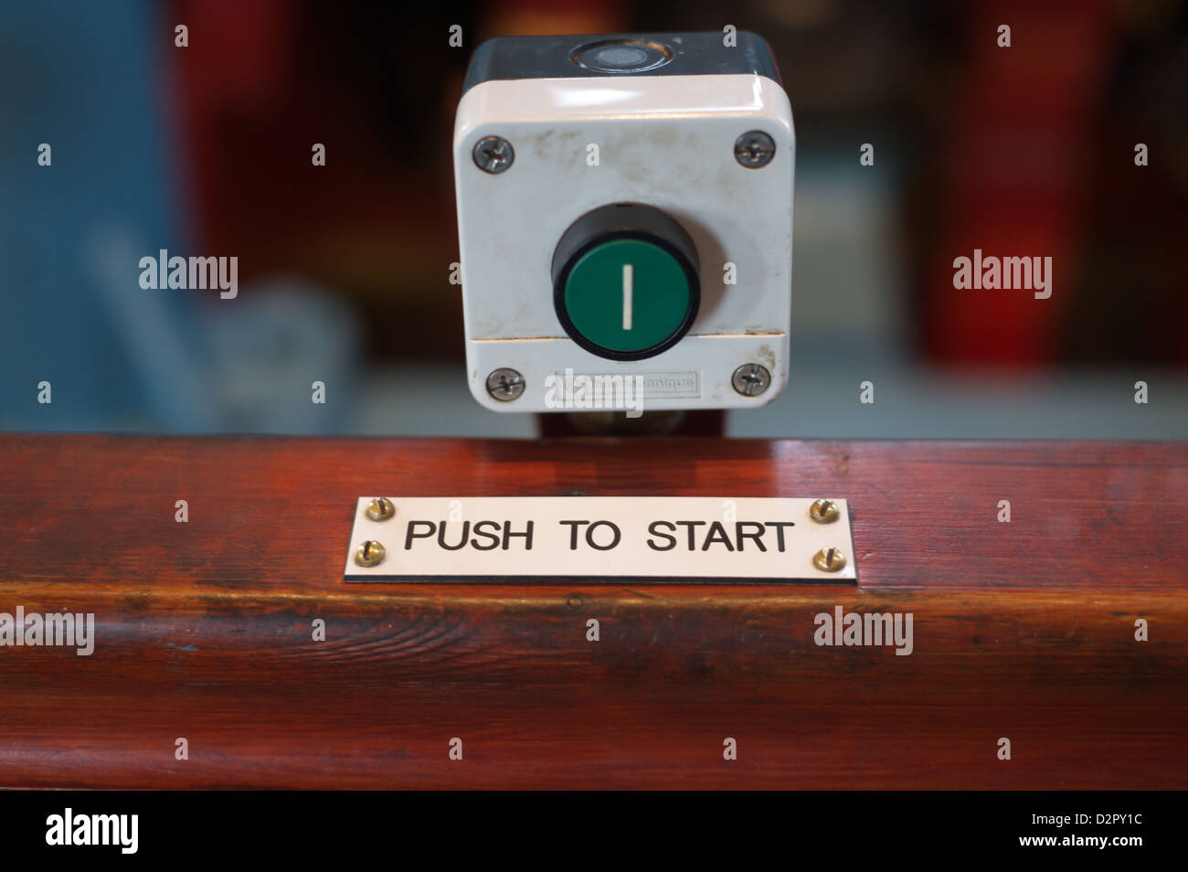 Push to start button on an old industrial machine Stock Photo - Alamy