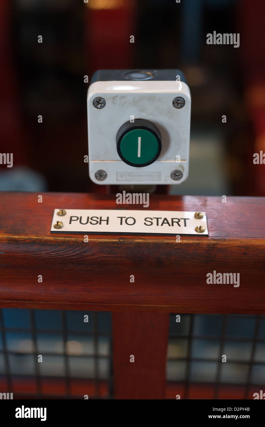 Push to start button on an old industrial machine Stock Photo - Alamy