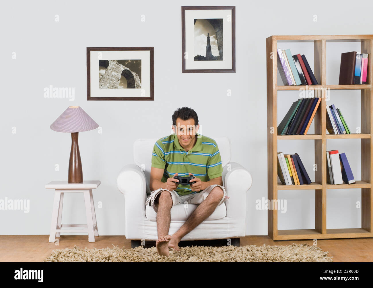 Man playing a video game Stock Photo - Alamy