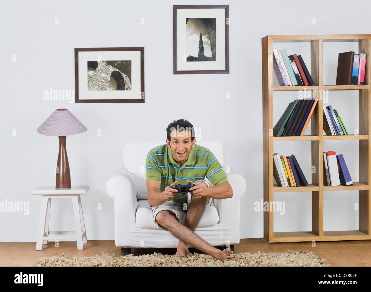 Man playing a video game Stock Photo - Alamy