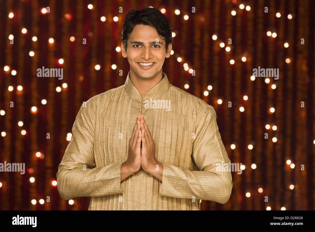 Portrait of a man greeting Stock Photo - Alamy
