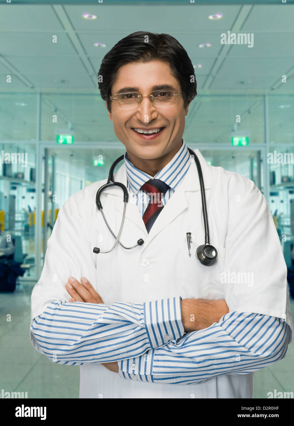 Portrait of a male doctor smiling Stock Photo - Alamy