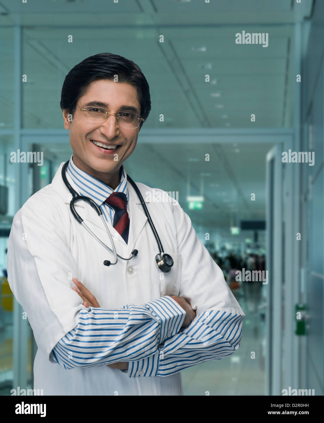 Portrait of a male doctor smiling Stock Photo - Alamy