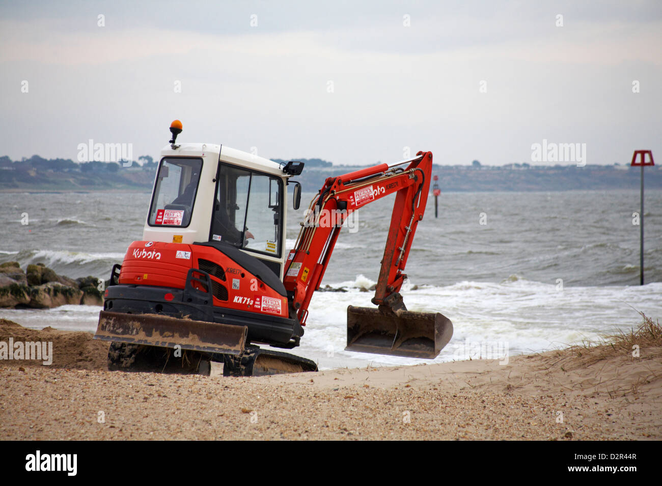 Digger on the beach hi-res stock photography and images - Alamy