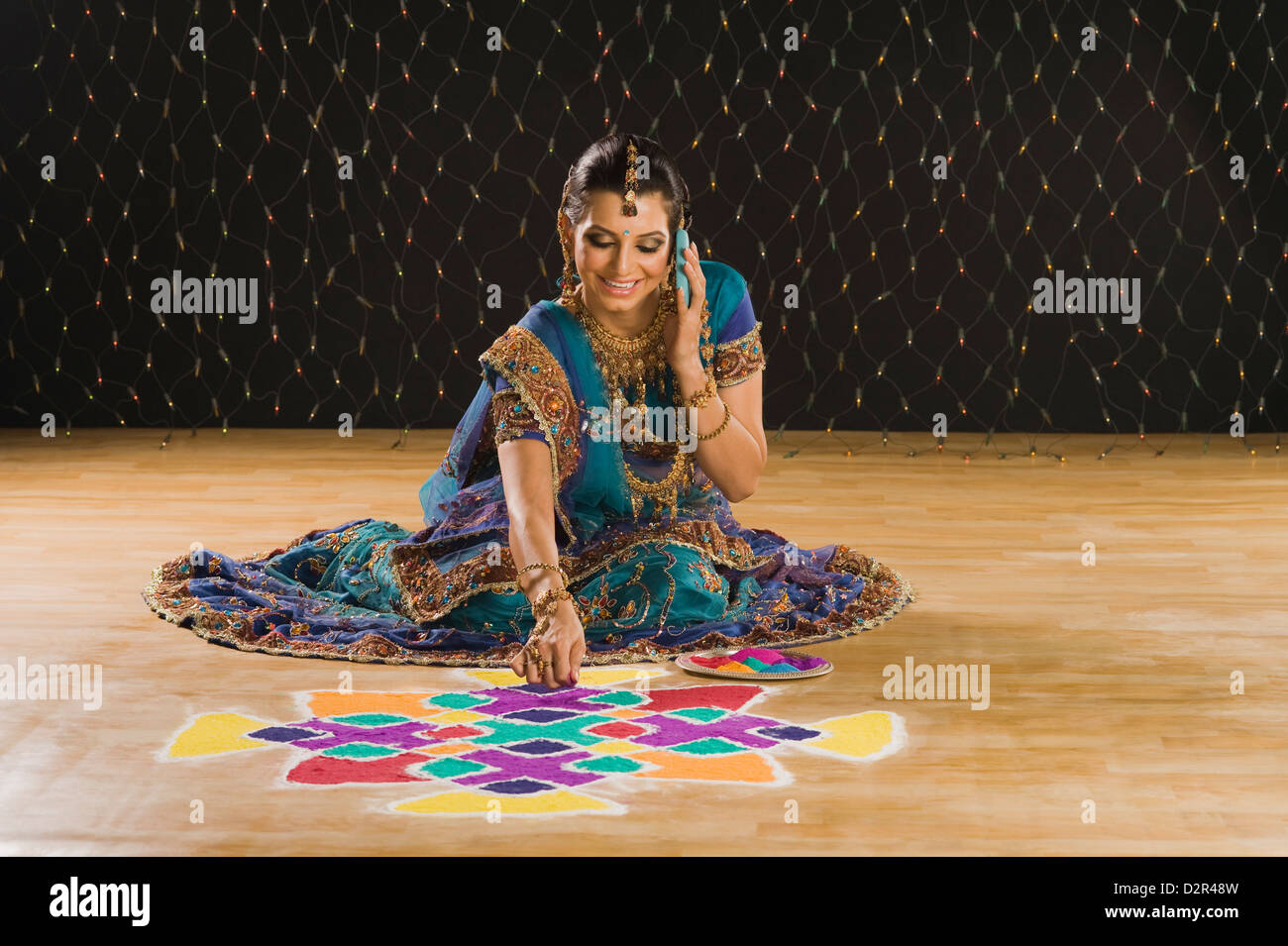 India woman rangoli pattern hi-res stock photography and images - Alamy