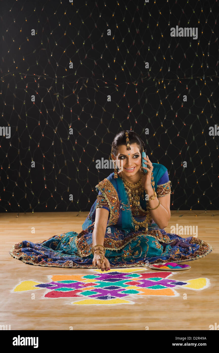 India woman rangoli pattern hi-res stock photography and images - Alamy