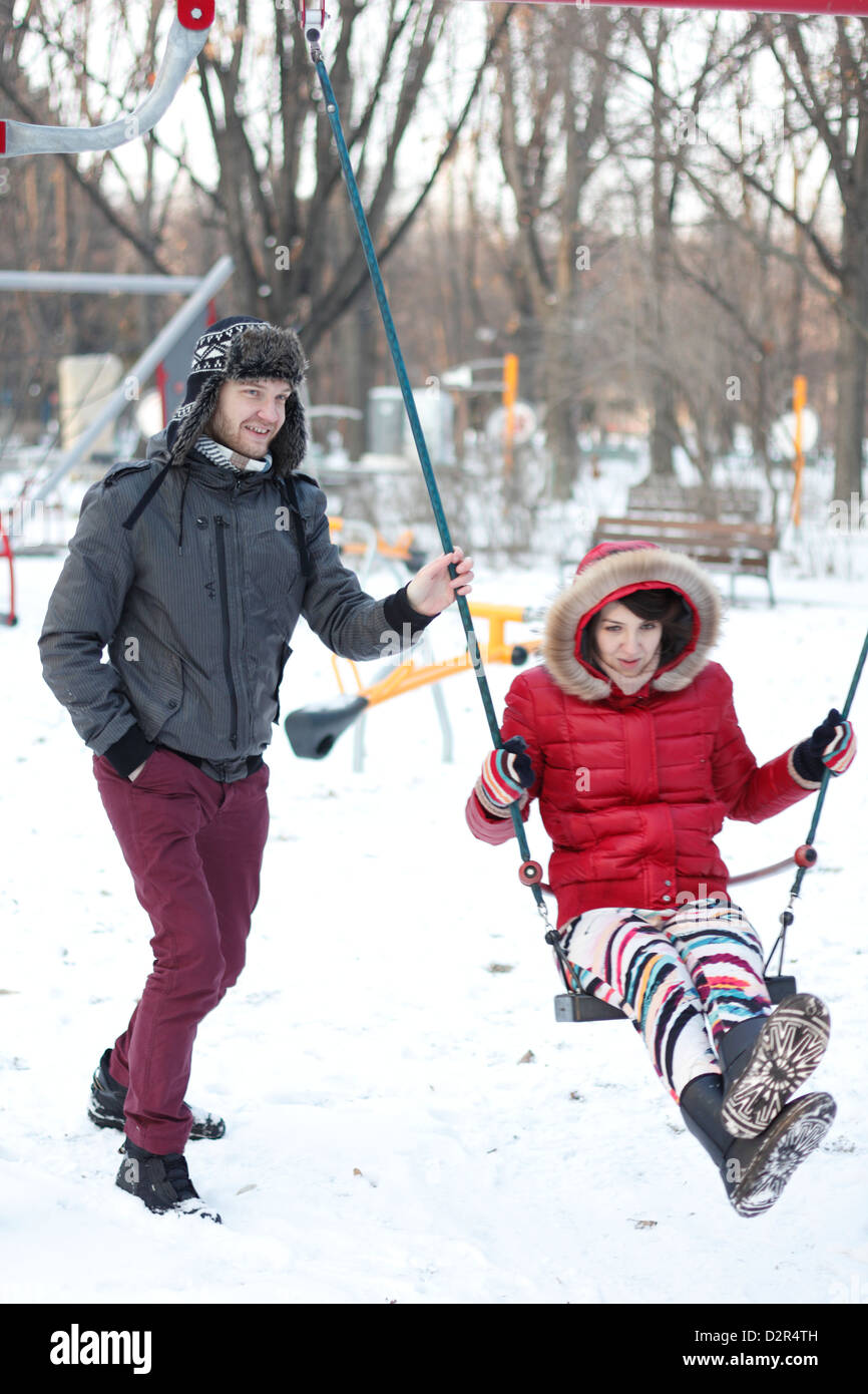 Couple spending a day outside in the snow Stock Photo - Alamy
