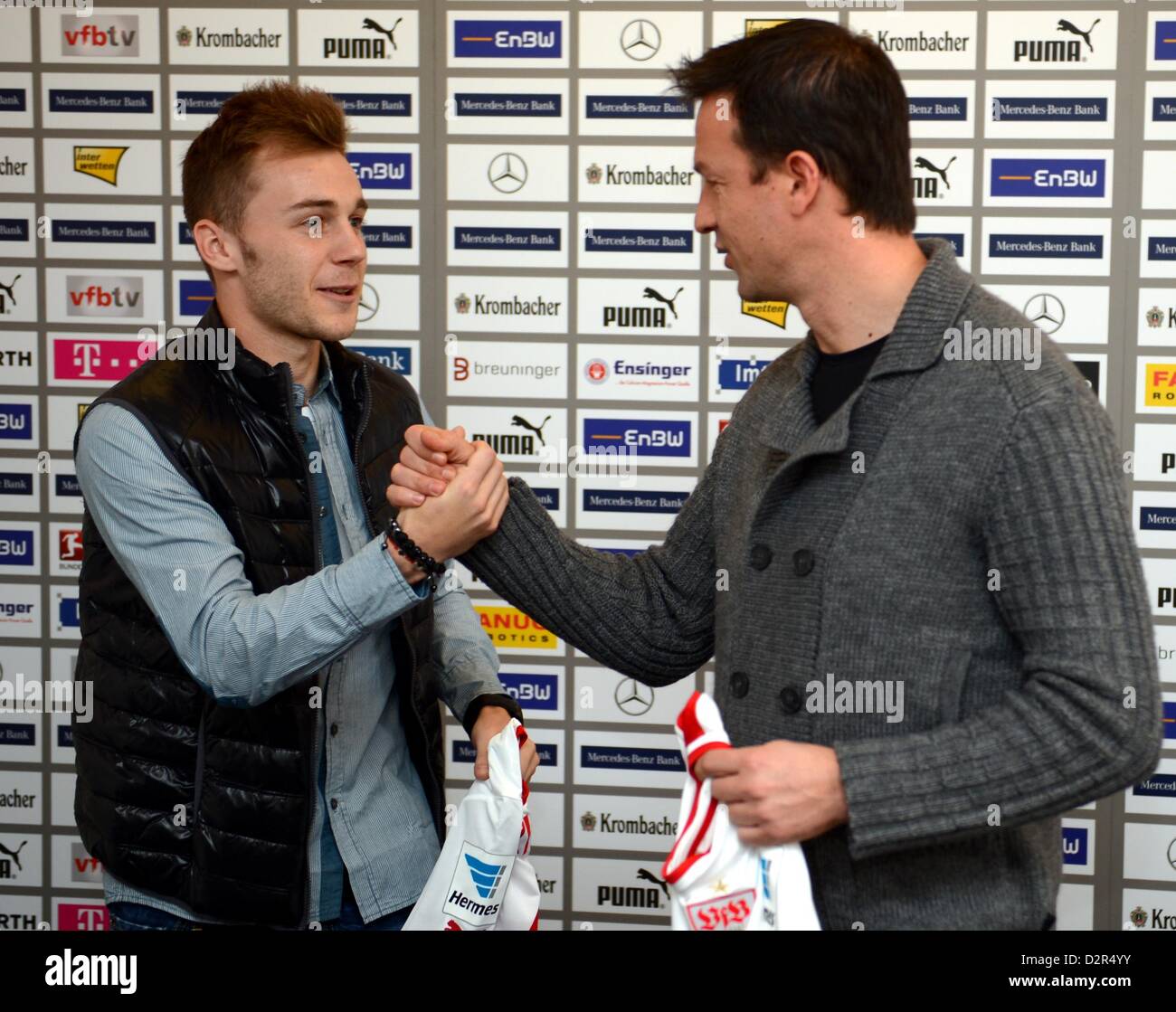 Romanian soccer player Alexandru Maxim (L) highfives with Stuttgart's ...