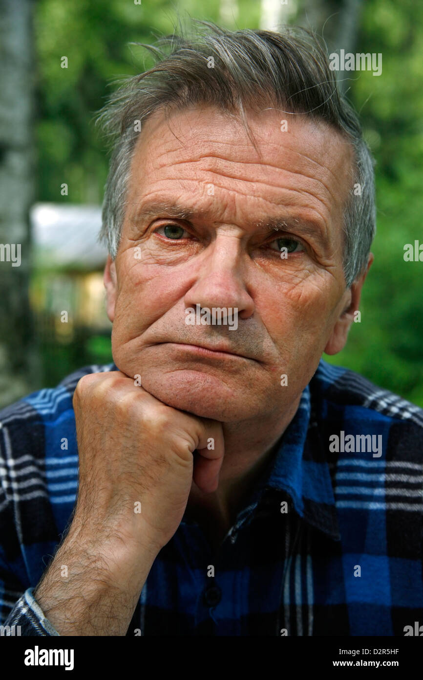 Portrait of the elderly tired man Stock Photo - Alamy