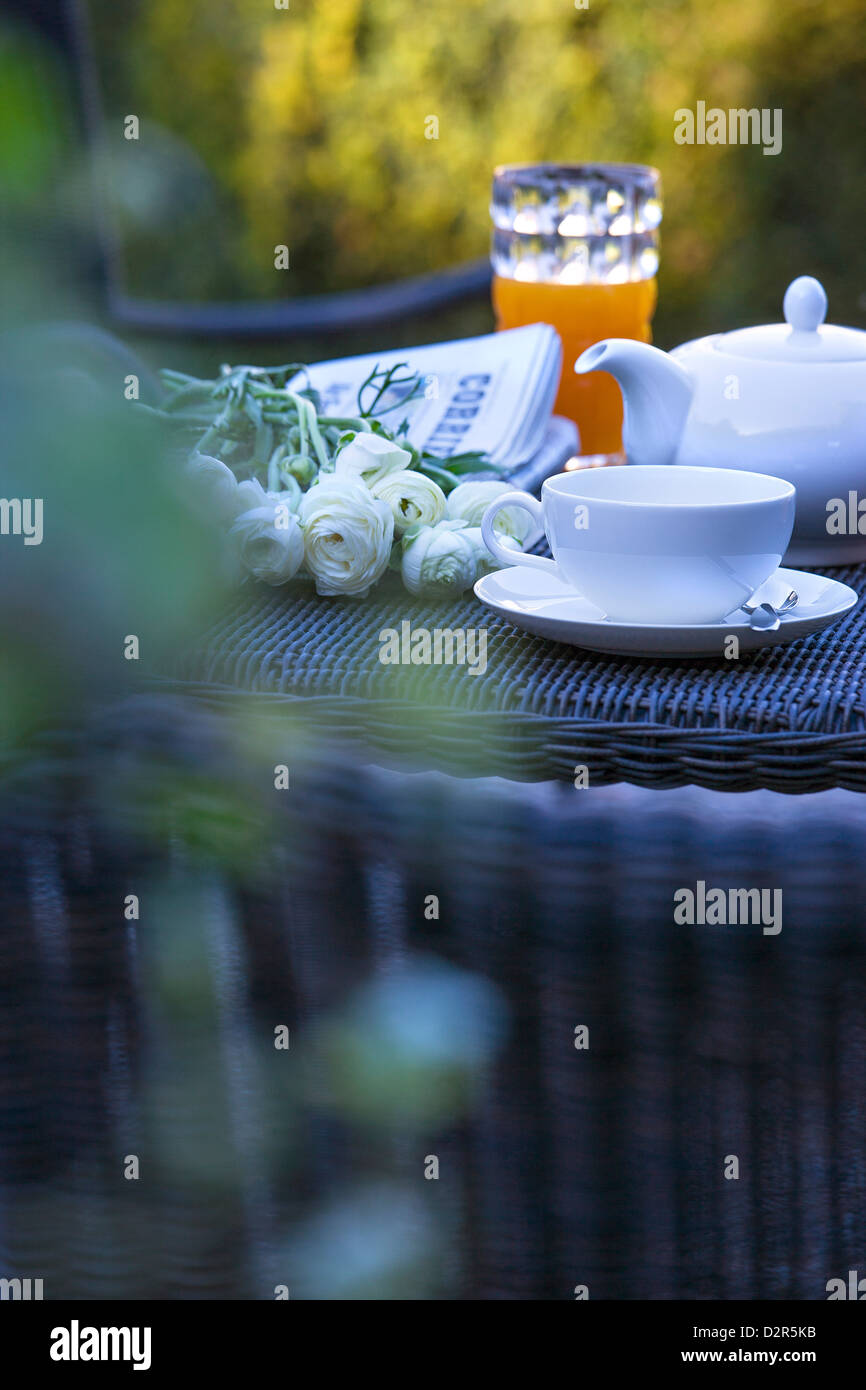 Breakfast table in an Italian garden Stock Photo - Alamy