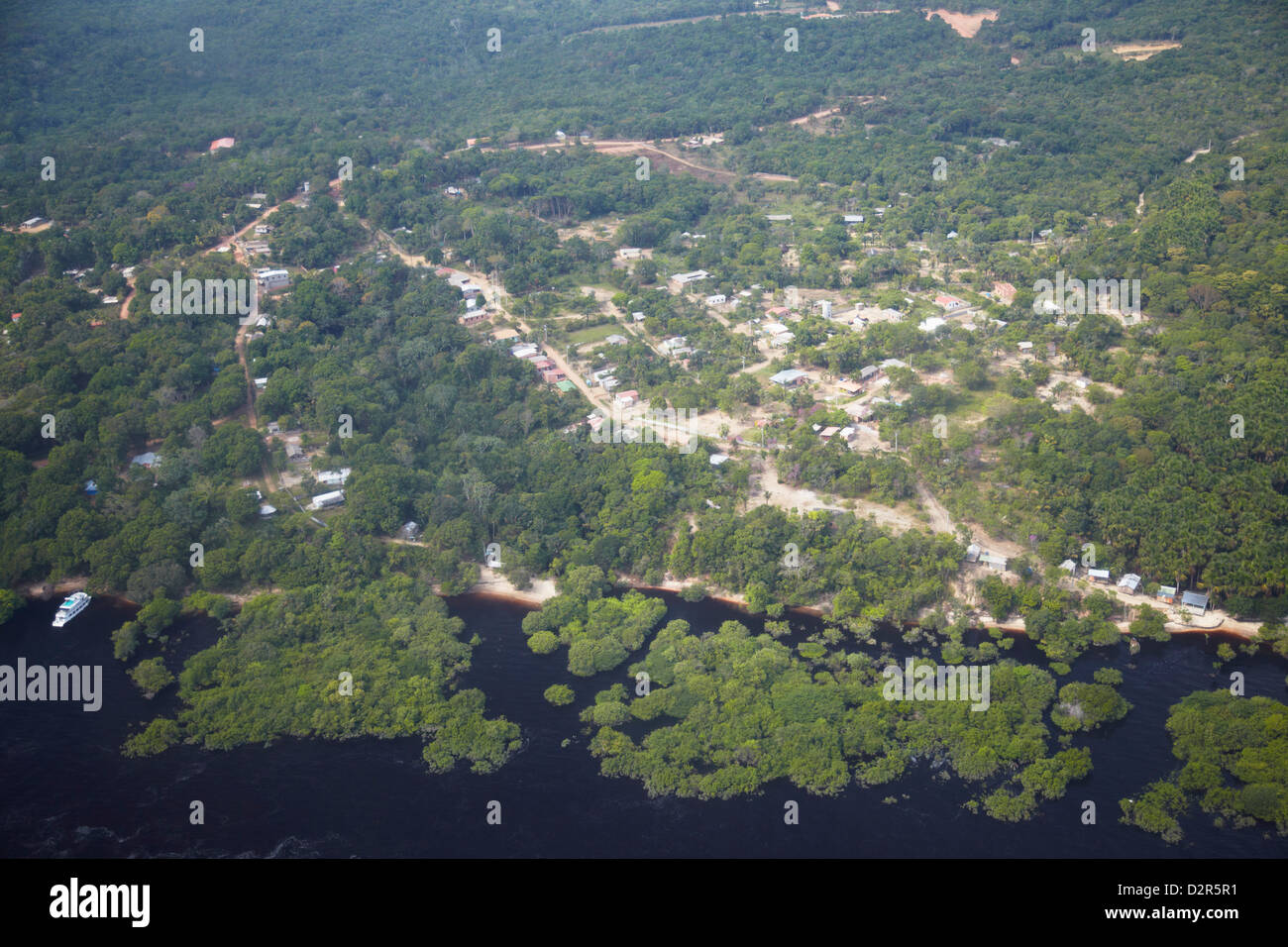 Aerial view of settlement in Amazon rainforest along the Rio Negro ...