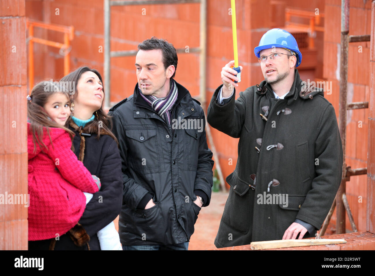 Family visiting construction site Stock Photo - Alamy