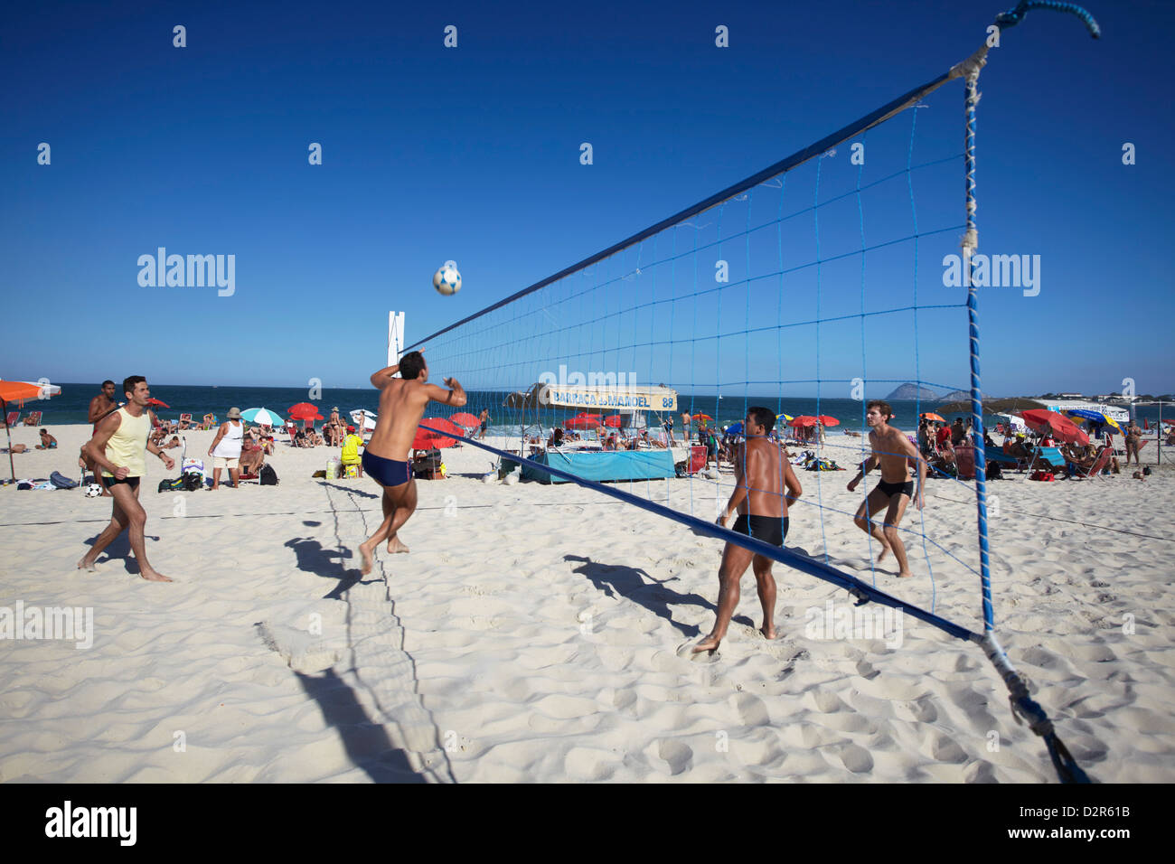 Men playing foot volley (futevolei) on Copacabana beach, Rio de Janeiro ...