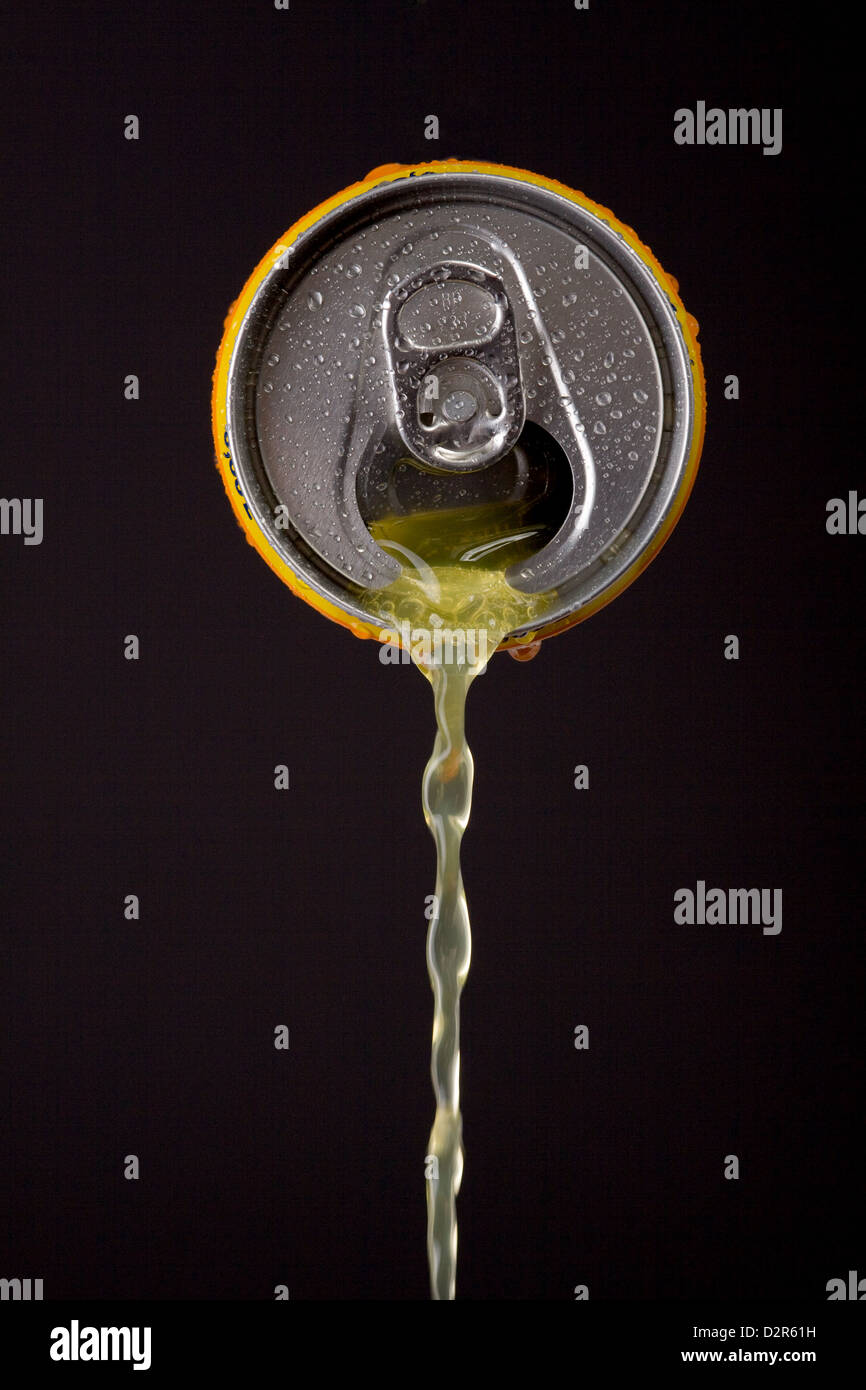 Beverage can is poured Stock Photo - Alamy