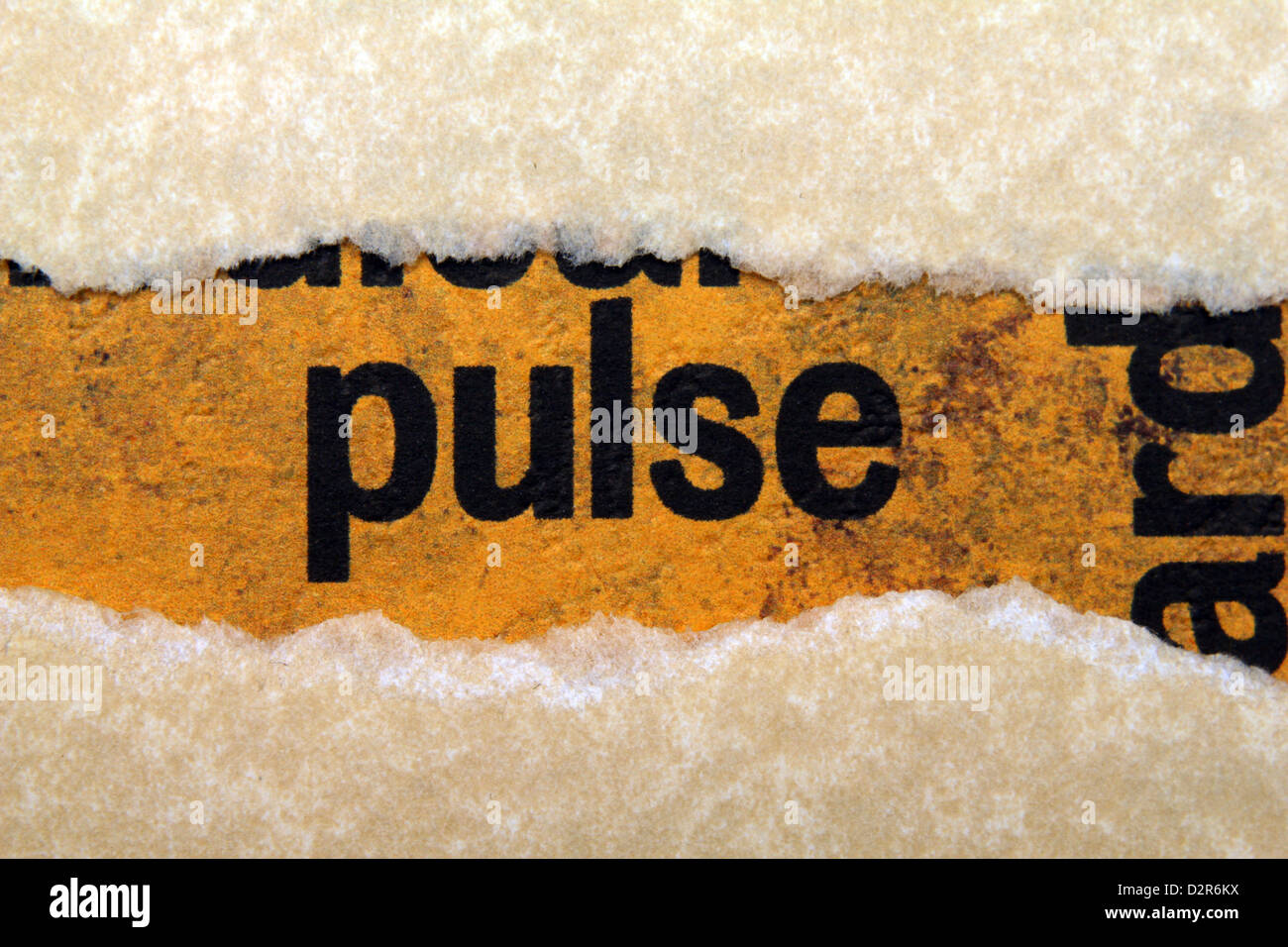 Pulse text on paper hole Stock Photo - Alamy