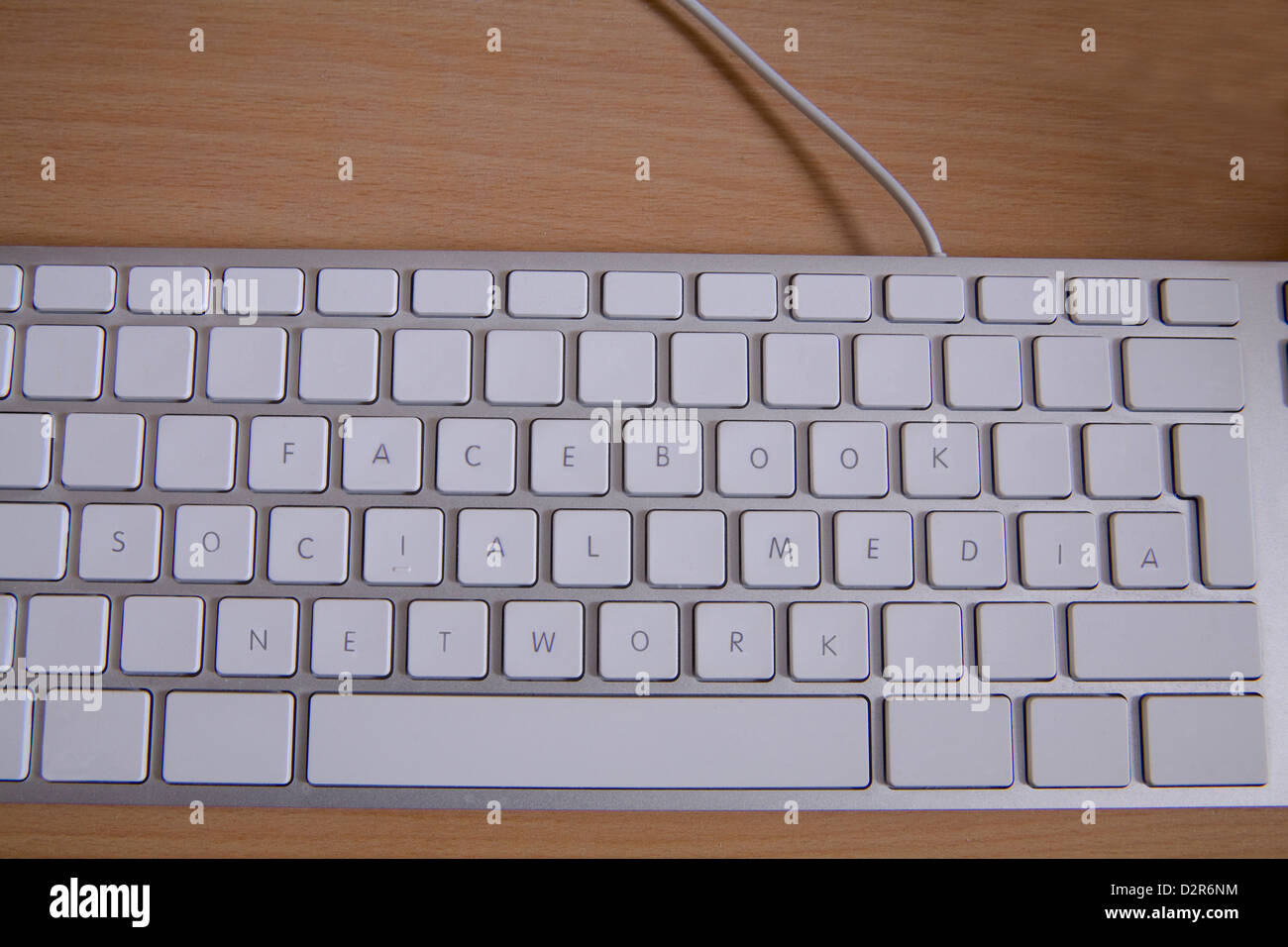 Close up computer keyboard spelling out words Facebook Social Media ...
