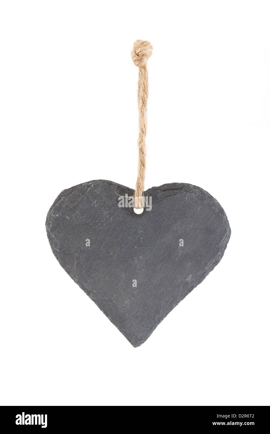 Heart shaped piece of slate over white Stock Photo - Alamy