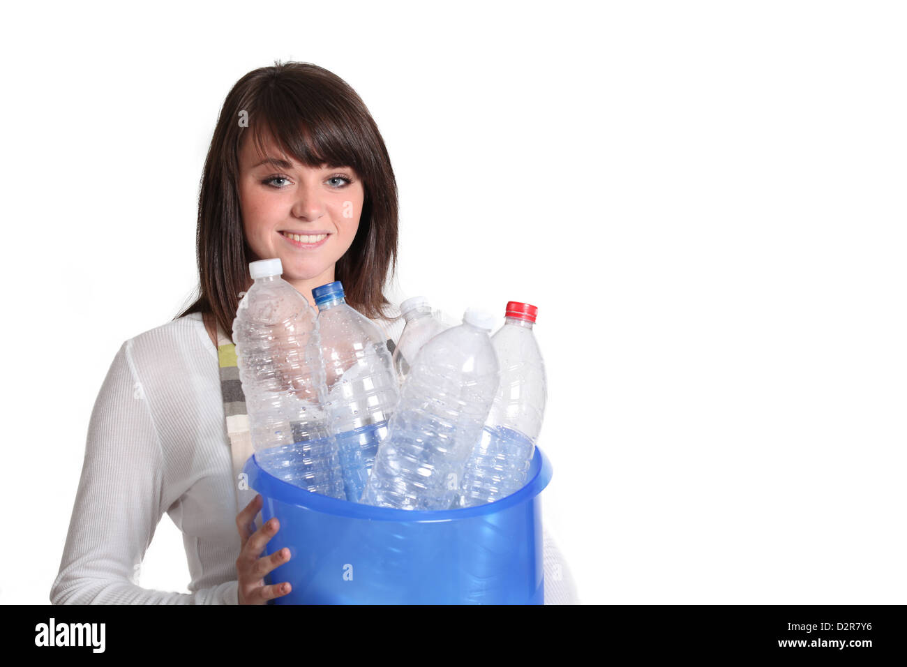 Girl sorting plastic bottles for garbage Stock Photo - Alamy