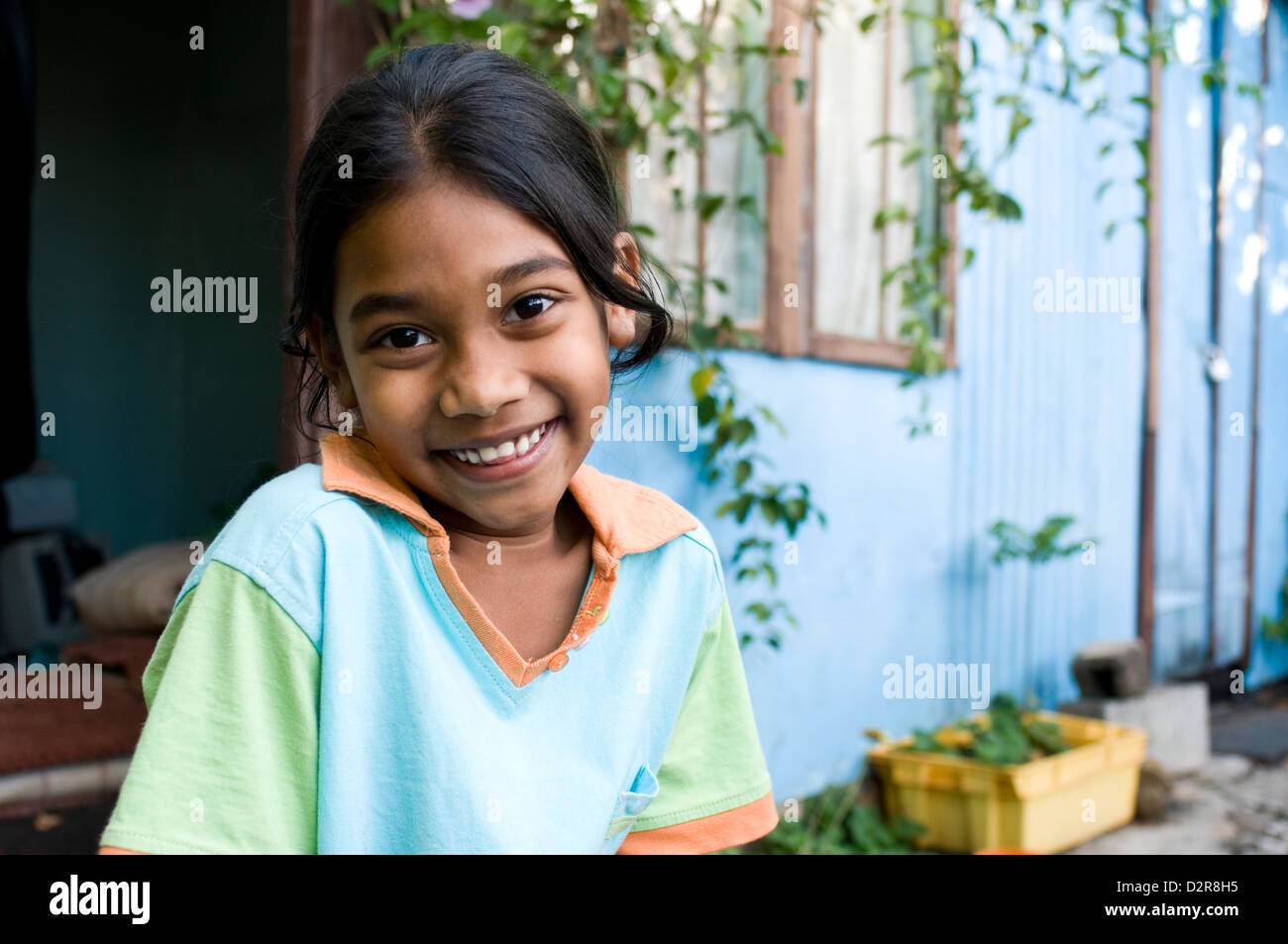 young girl at creole cottage, port louis, mauritius Stock Photo - Alamy
