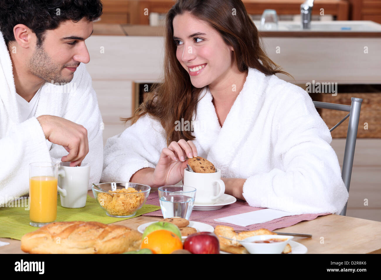 Couple having breakfast together Stock Photo - Alamy