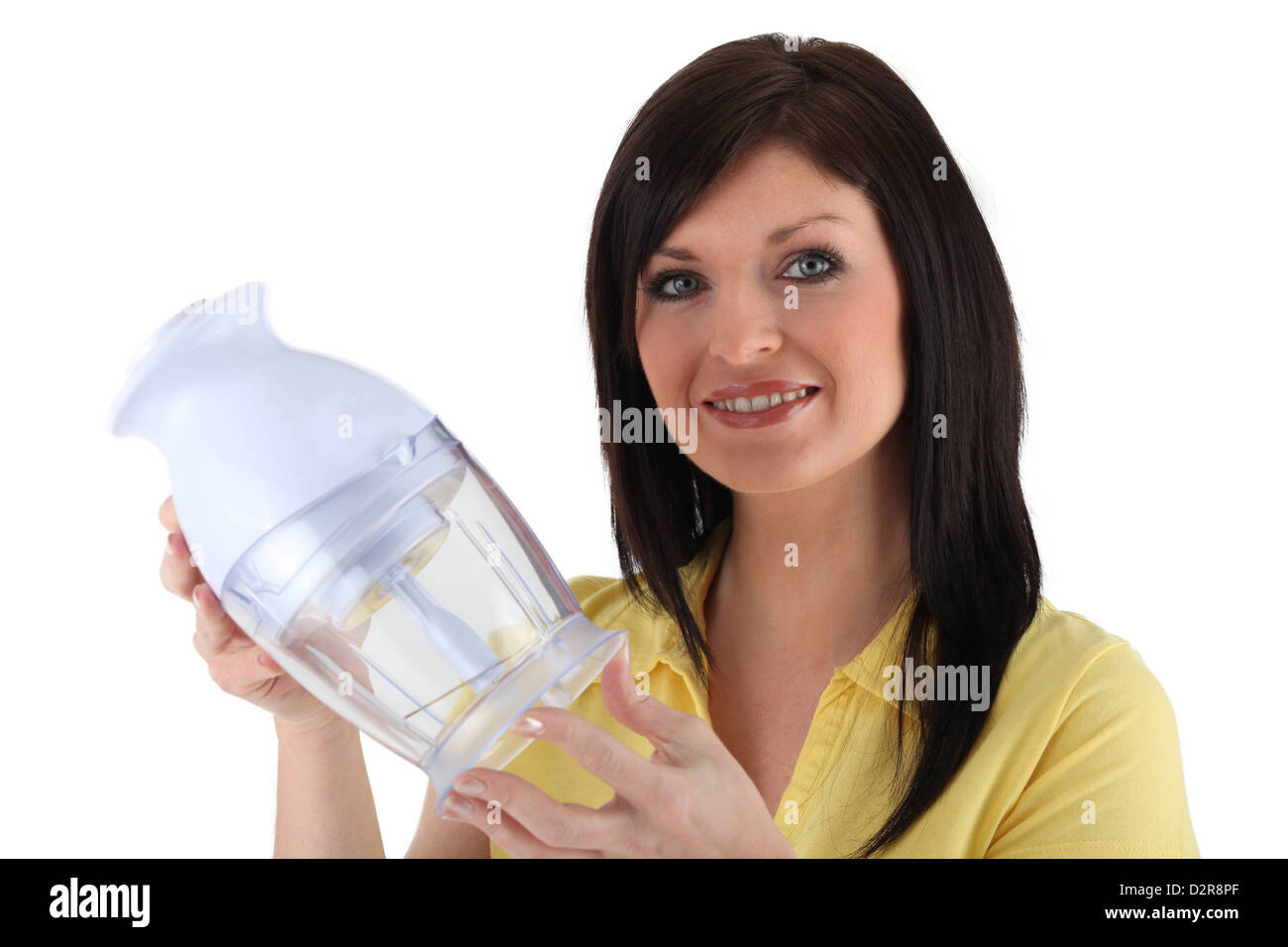 Woman with a mini blender Stock Photo - Alamy