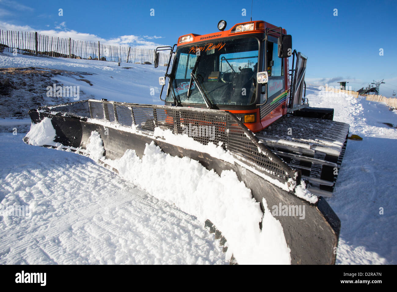 A piste basher on a ski run in the Cairngorm mountains. climate change ...