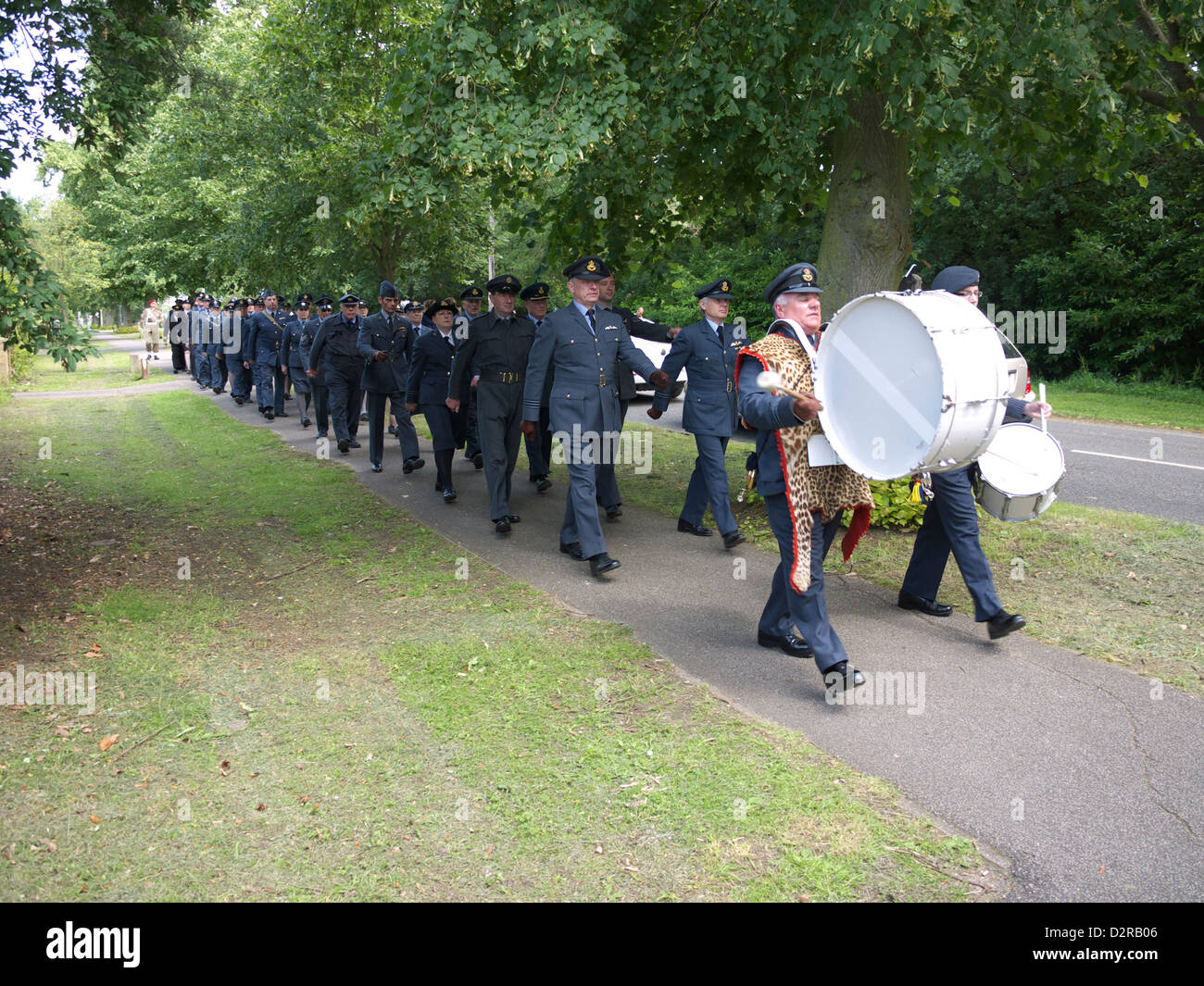 Reenactors and ex RAF service personnel marching to the Memorial ...