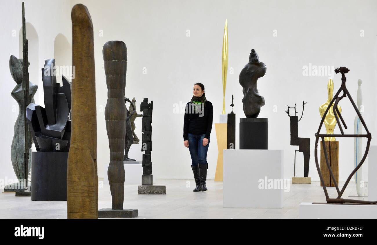 A young woman looks at the exhibition "Ein Wald der Skulpturen - Die ...