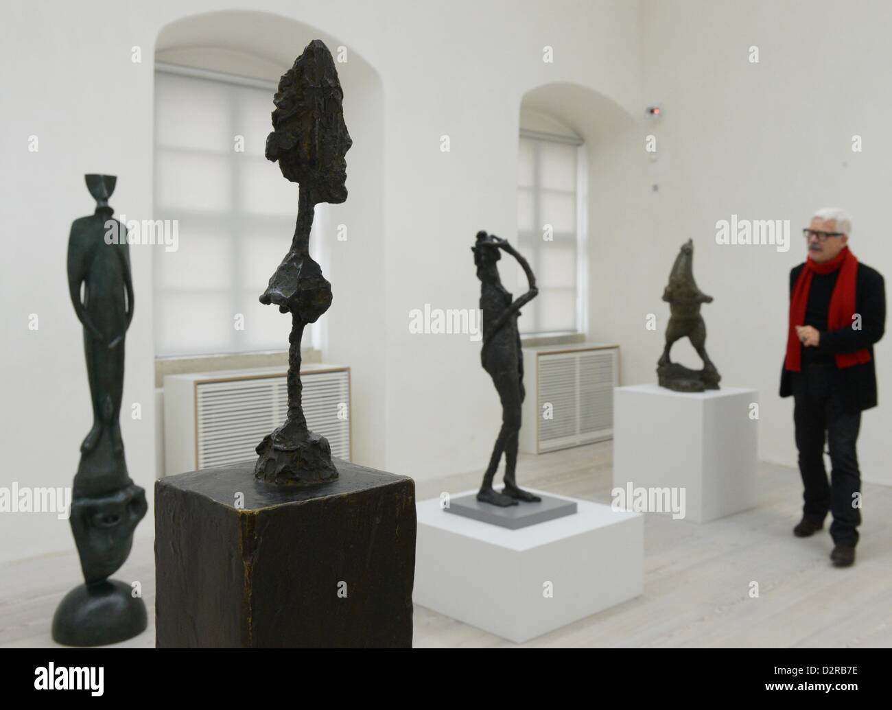 A man looks at the exhibition "Ein Wald der Skulpturen - Die Sammlung ...