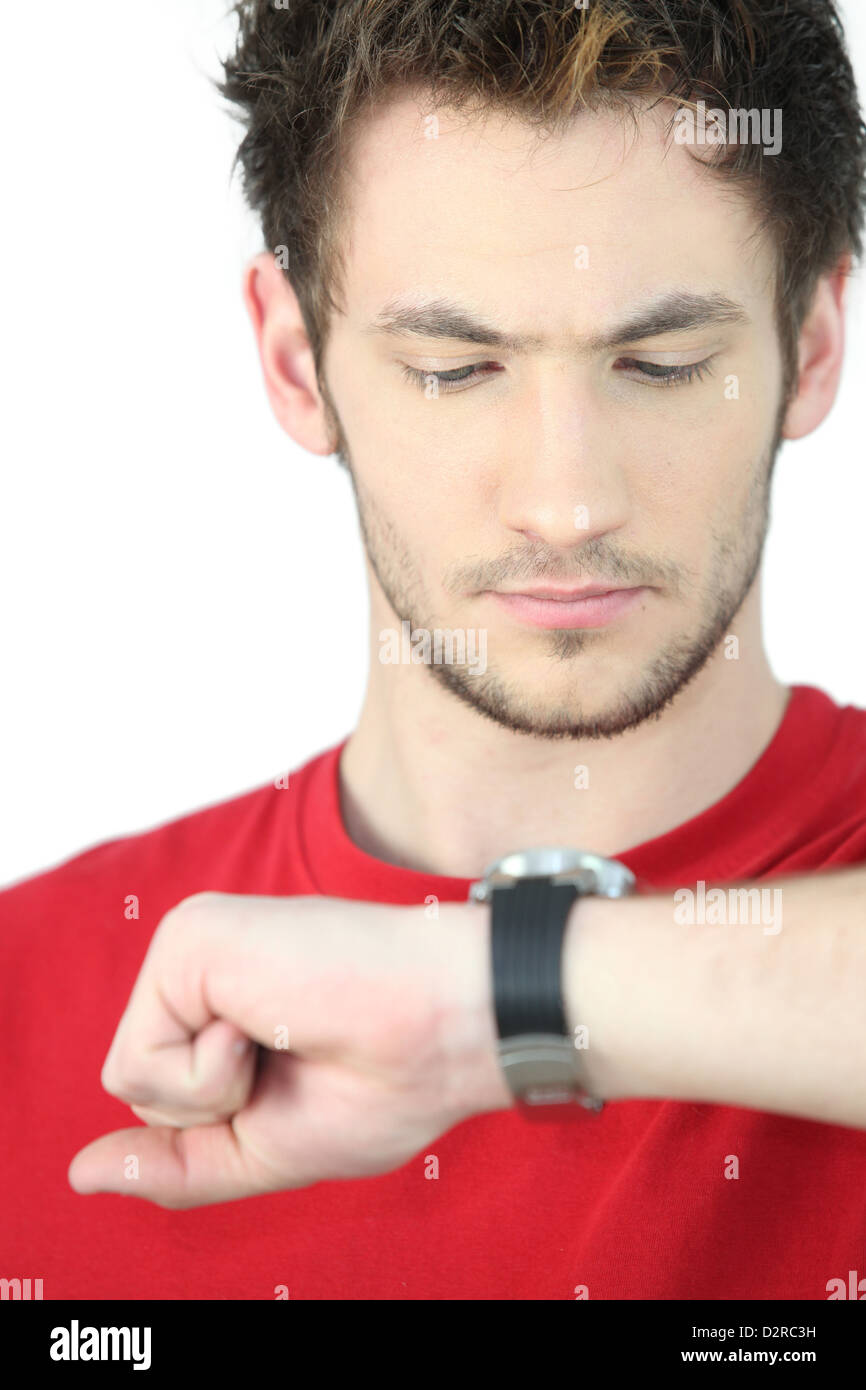 Man looking at the time Stock Photo - Alamy