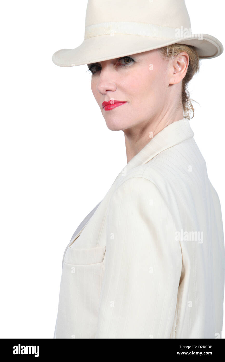 Woman wearing cream coloured suite Stock Photo - Alamy