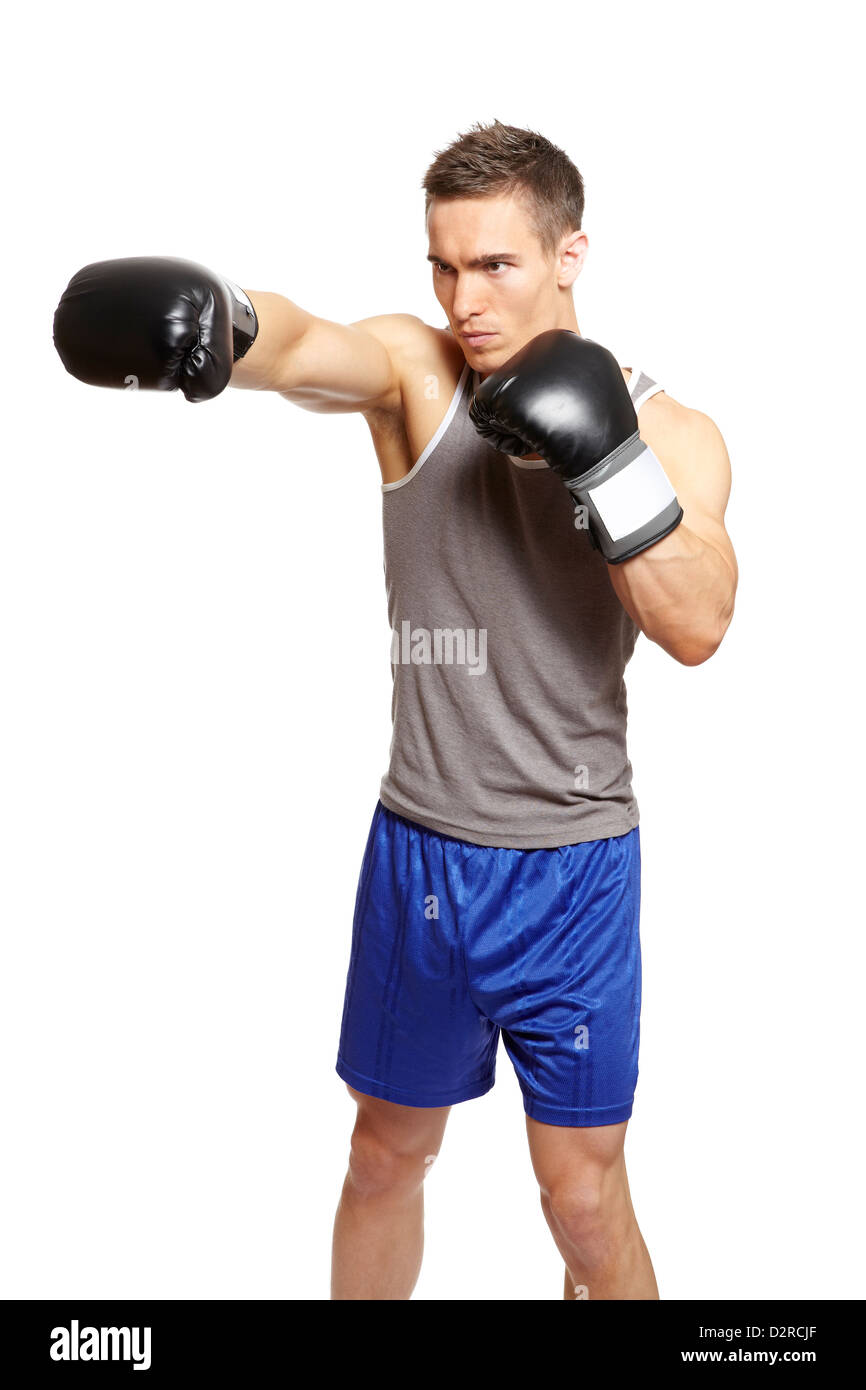 Muscular young man with boxing gloves in sports outfit on white ...