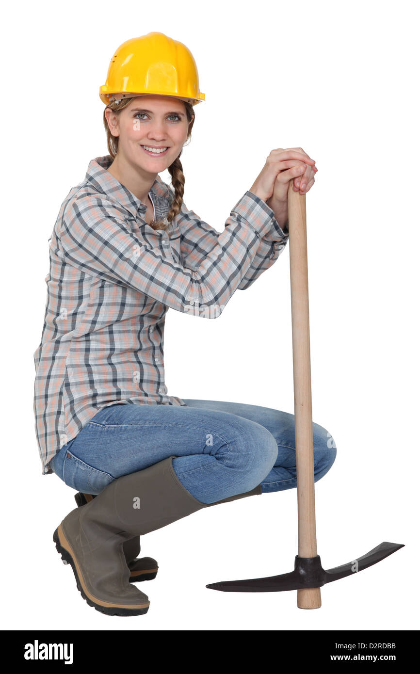 A woman with a pickaxe Stock Photo - Alamy