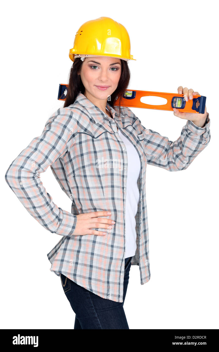 Woman with spirit-level Stock Photo - Alamy