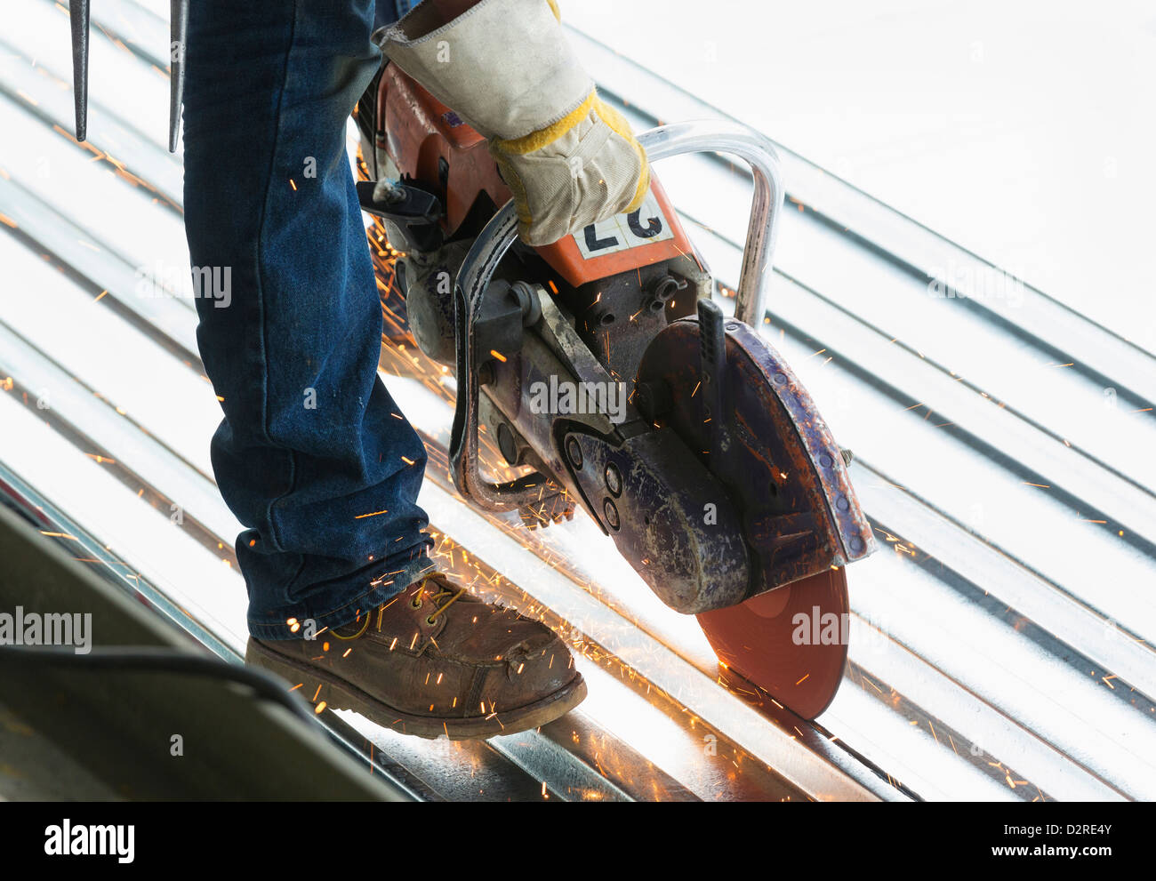 Hispanic man working at construction site Stock Photo - Alamy