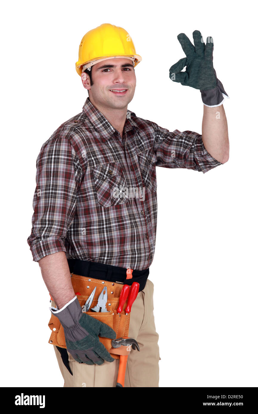 Construction worker giving his sign of approval Stock Photo - Alamy