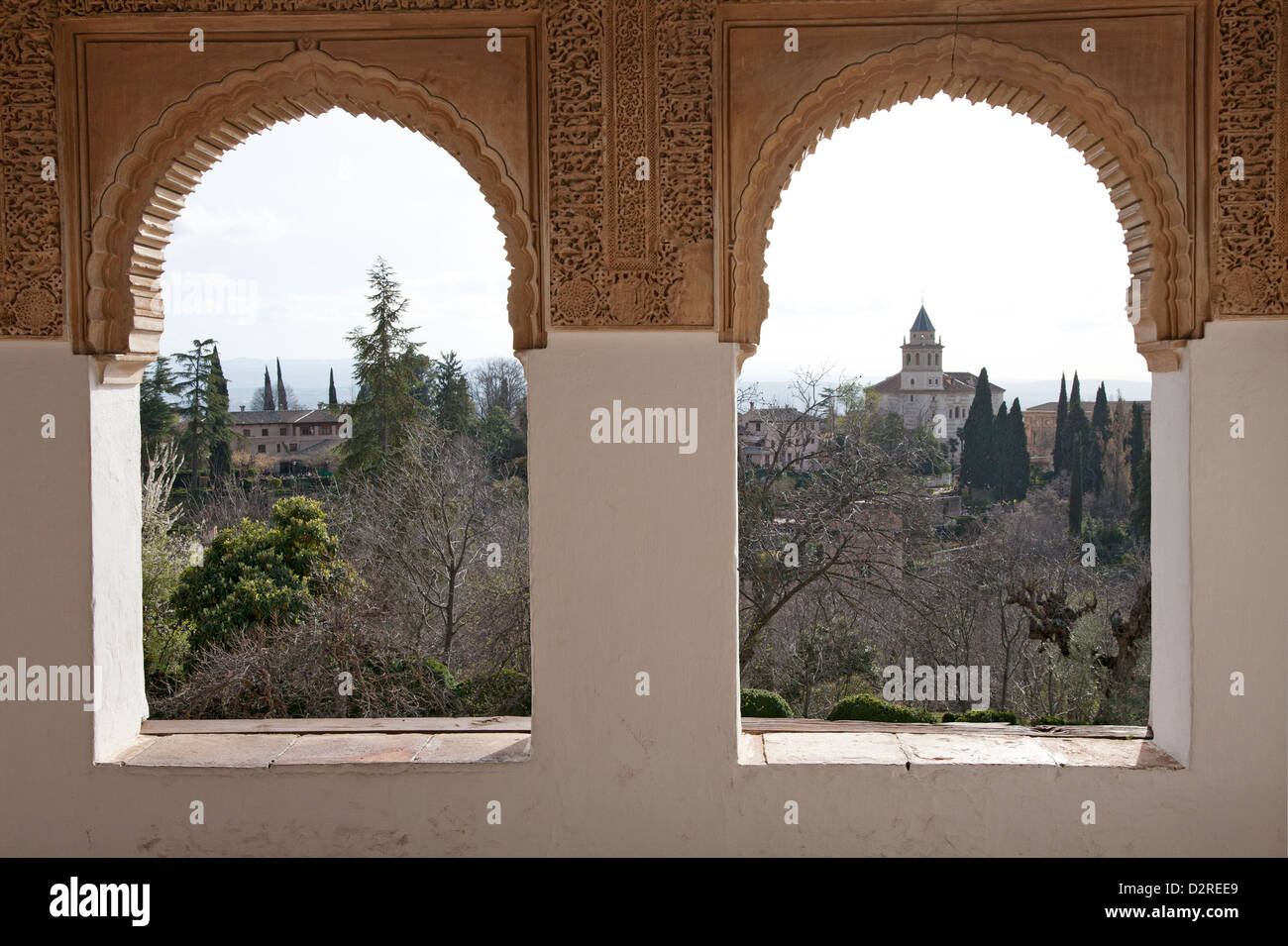 The Alhambra gardens and architecture viewed through twin Moorish style ...