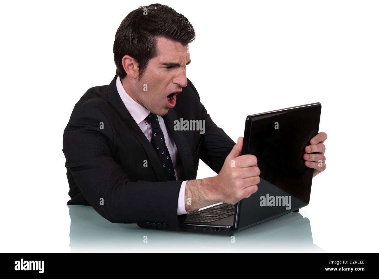 Man is screaming in front of his is laptop hi-res stock photography and ...