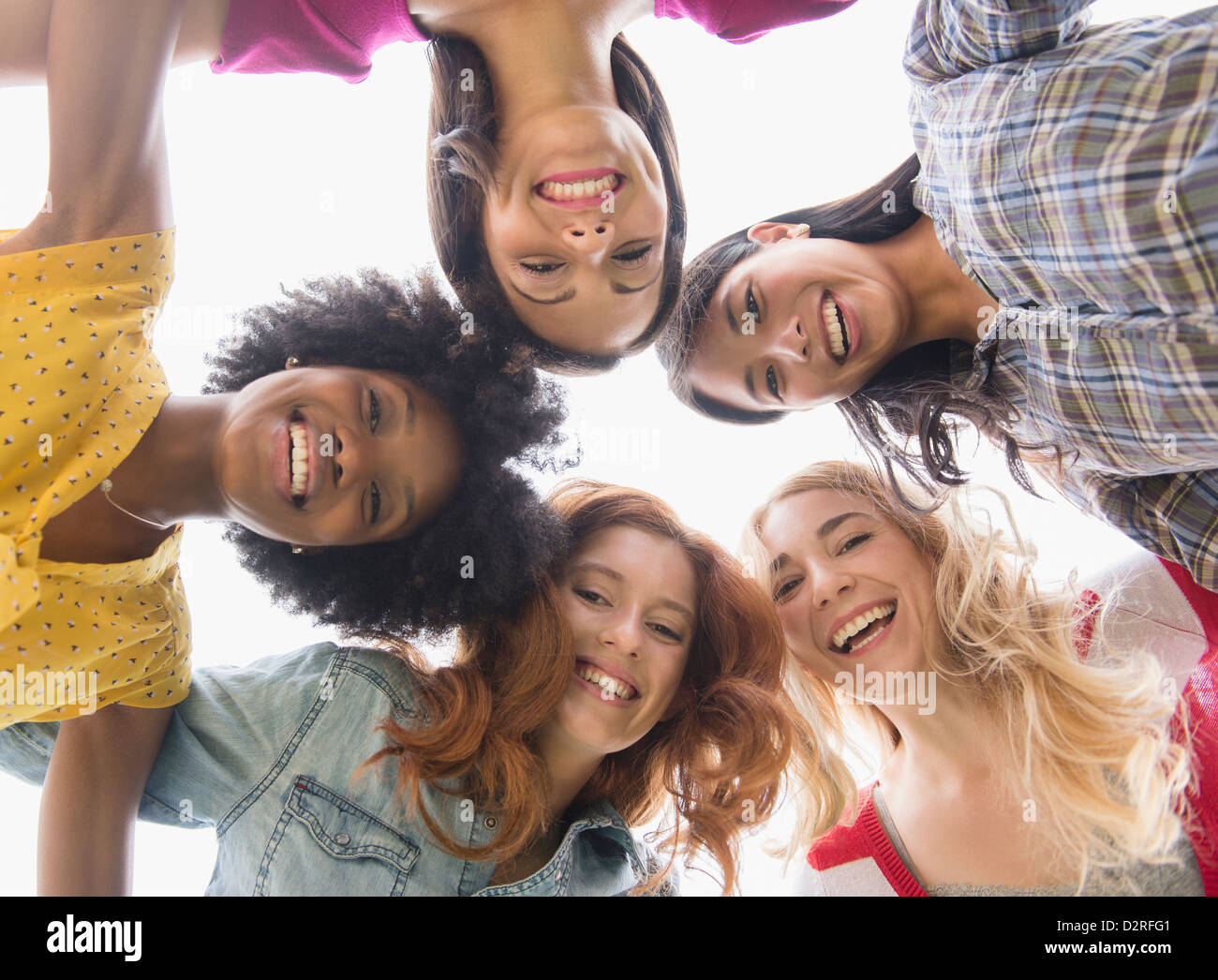 Five women standing in circle hi-res stock photography and images - Alamy