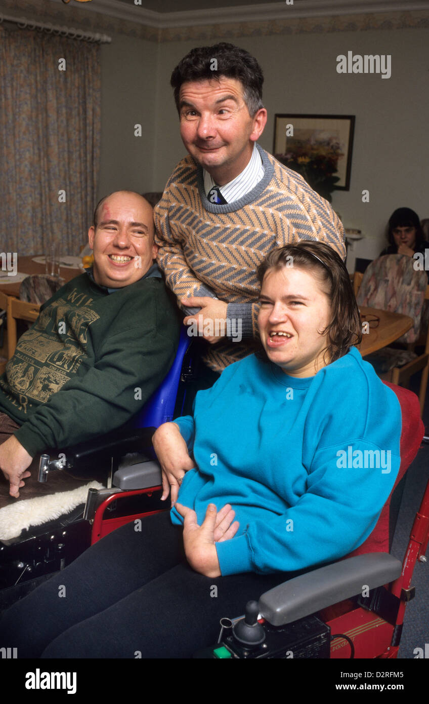 Group of disabled friends in a residential centre Stock Photo - Alamy