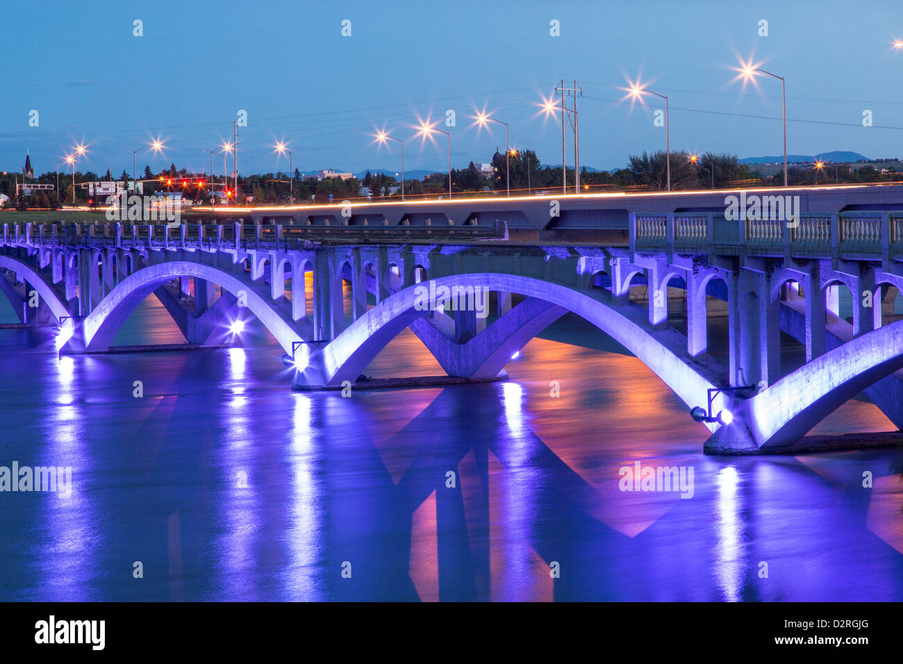 Historic Ninth Street Bridge glows at dusk on the Missouri River in ...