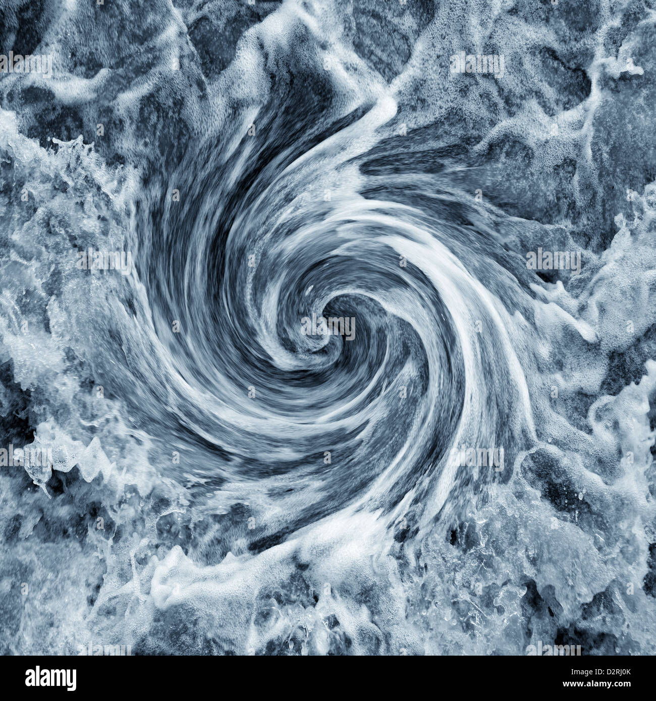 Abstract digitally created whirlpool with blue tint Stock Photo - Alamy